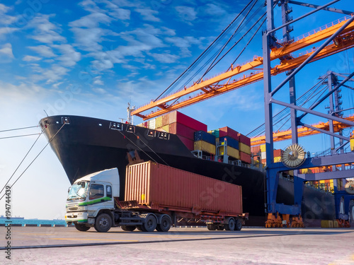 The container vessel during discharging at an industrial port and move ...