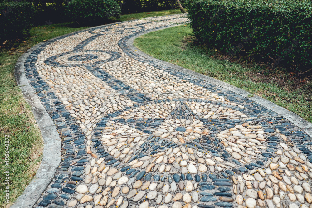 Pebbles walkway in the garden, Pebble river stone embedded in cement ...