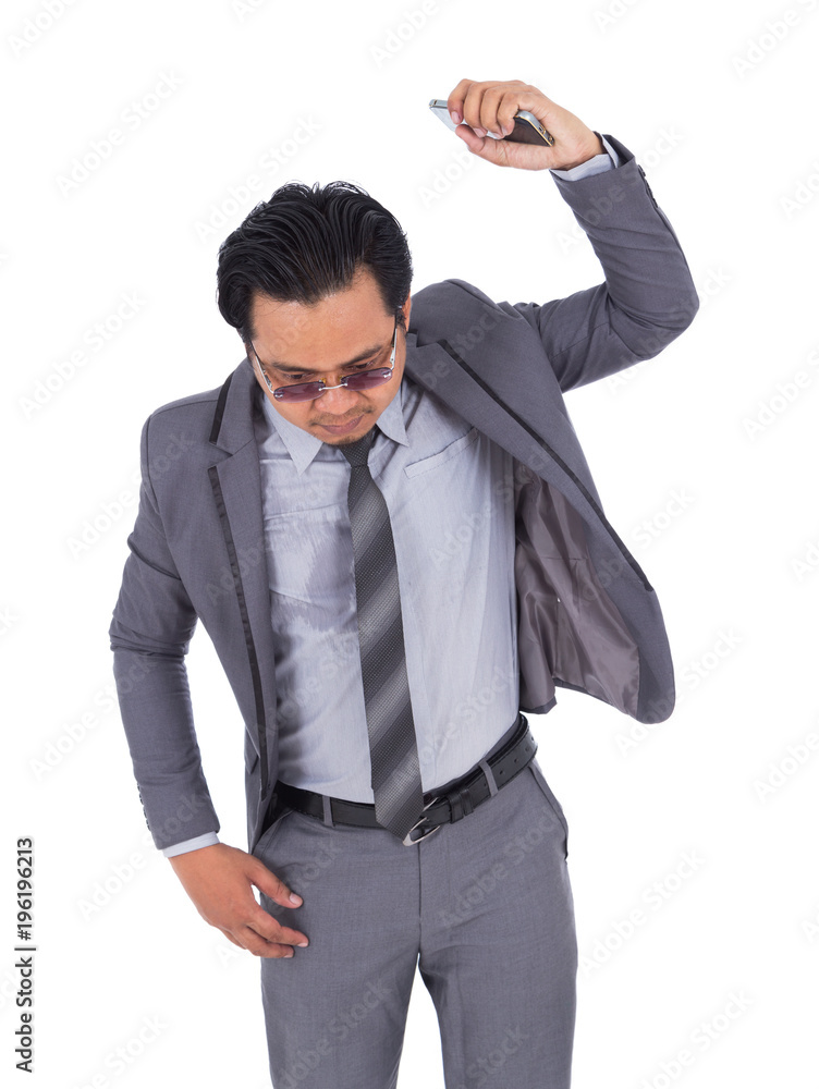 very angry businessman is throwing away his mobile phone isolated on ...