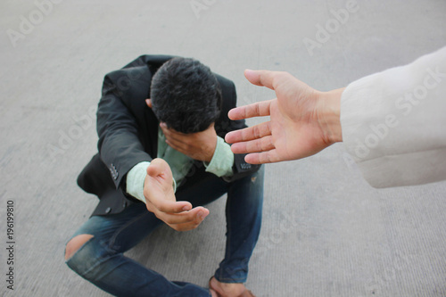 Help Concept, Hands reaching out to helping man sad and depressed ...