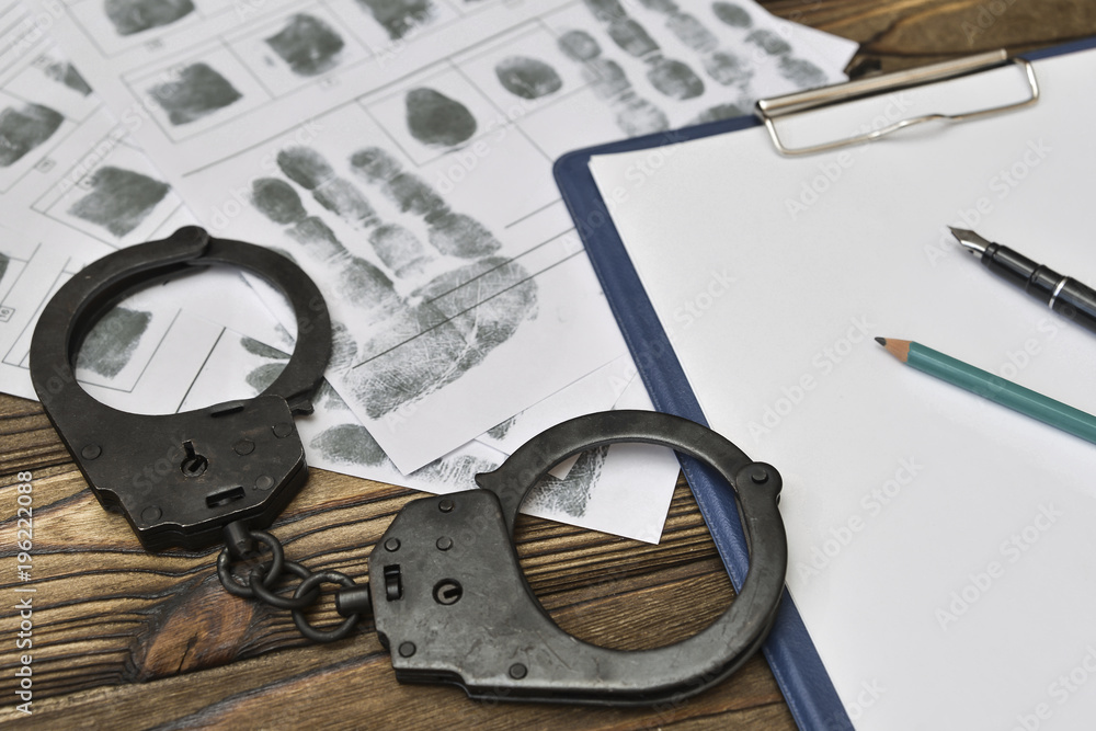 police report, handcuffs, fingerprints. Detective, officer. capture of ...