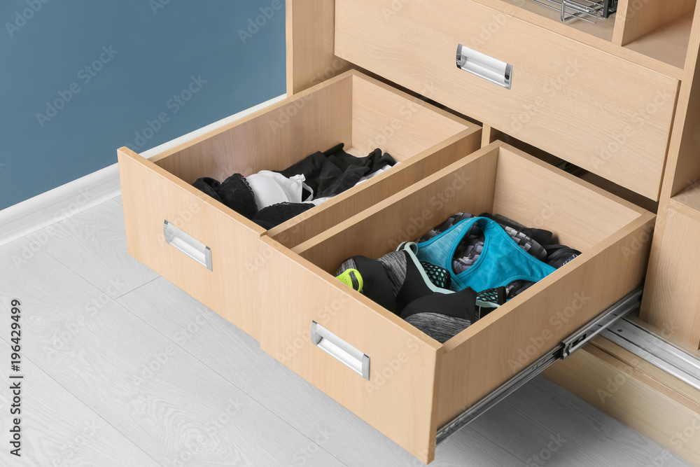Underwear in drawers of wardrobe closet Stock Photo | Adobe Stock