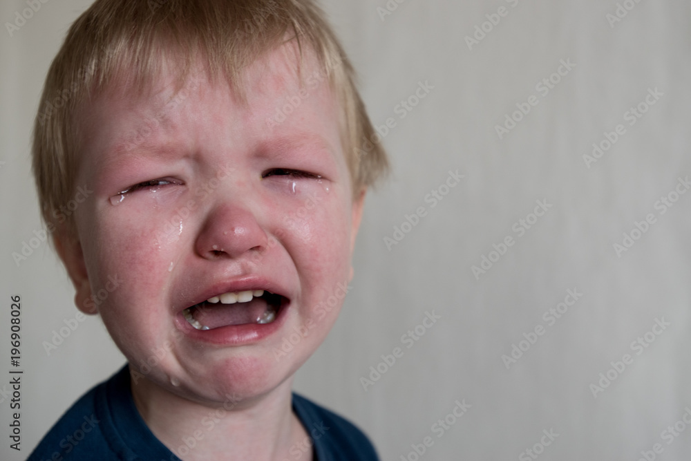 Cry. Portrait of boy. Caucasian child looks at camera. Charming boy the ...