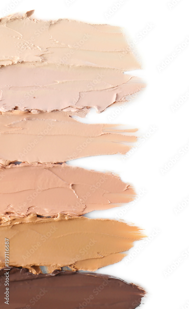 Different shades of foundation on white background. Professional makeup ...