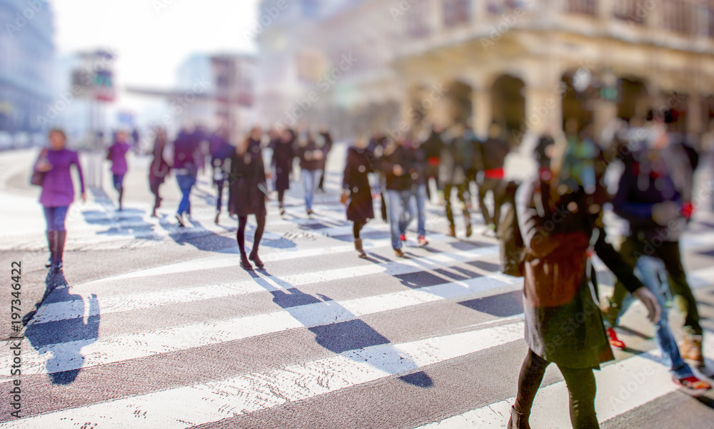 Crowd of anonymous people walking on busy city street, urban life ...