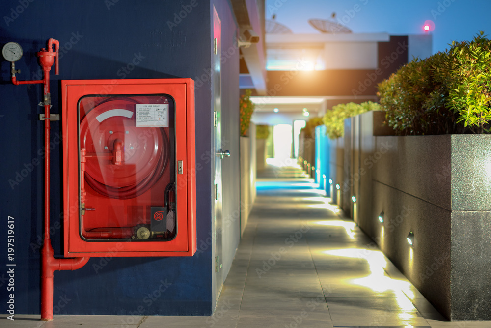 Fire Safety Concept, Fire extinguisher and fire hose reel in public ...