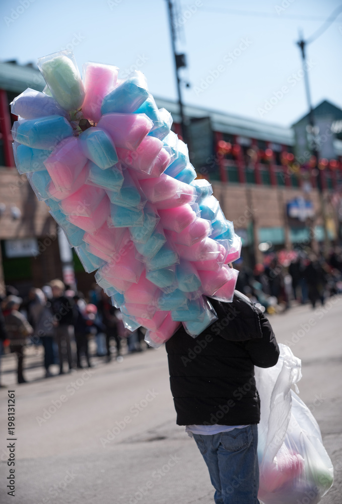 Man selling cotton candy at the parade Stock Photo | Adobe Stock