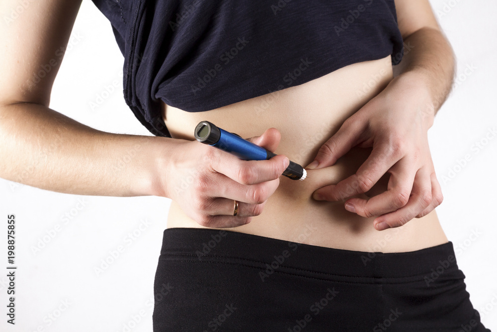 Diabetes patient shot by syringe with dose of insulin, subcutaneous ...