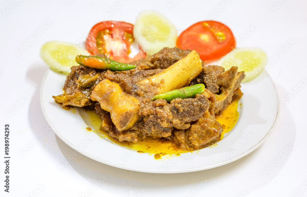 Popular Indian Bengali food meal of spicy mutton curry popularly known ...