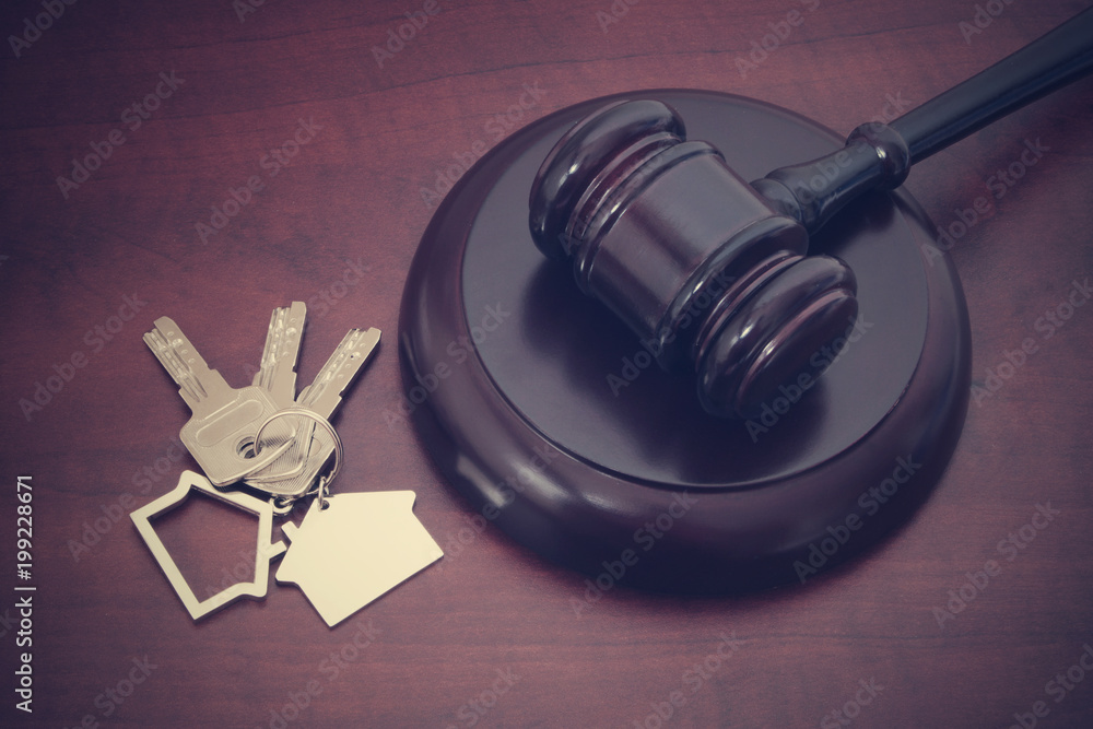 Judge gavel and key with kechain, legal and real estate theme Stock ...
