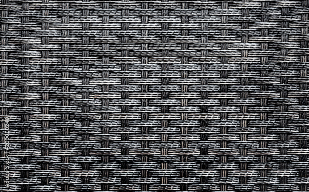 Stock-Foto „Black artificial rattan pattern. Background of basket ...