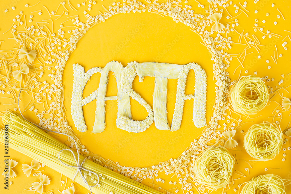 The word pasta is laid out in voluminous letters from small raw ...