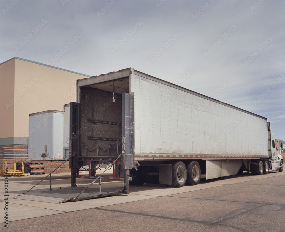 Heavy goods truck at loading depot facility Stock Photo | Adobe Stock
