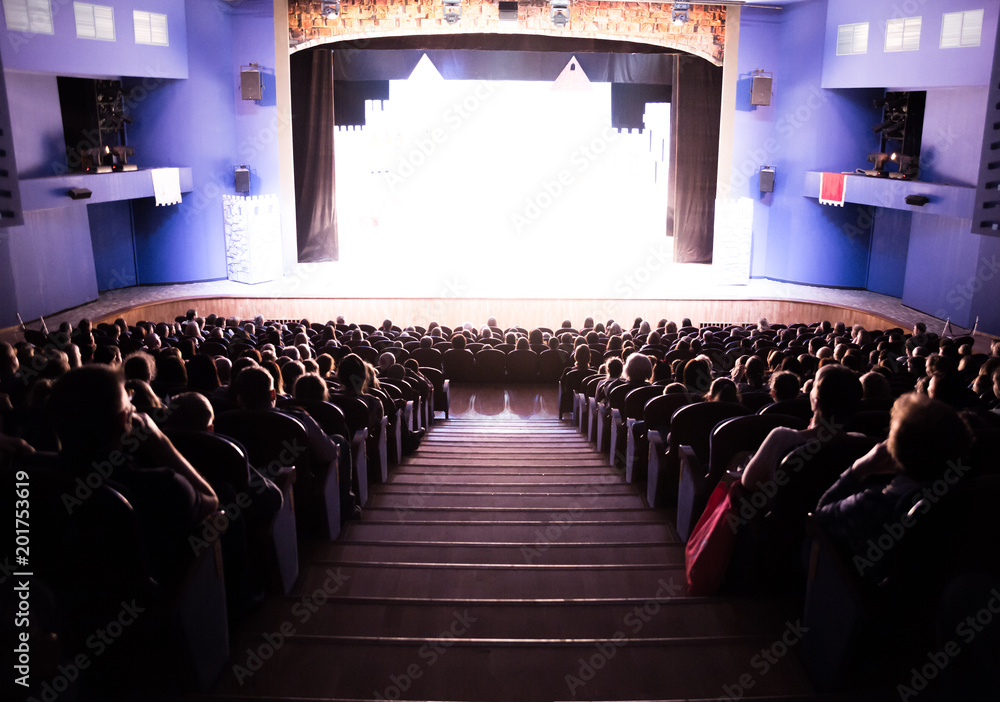 Auditorium in the theater during the performance. The scenery on the ...