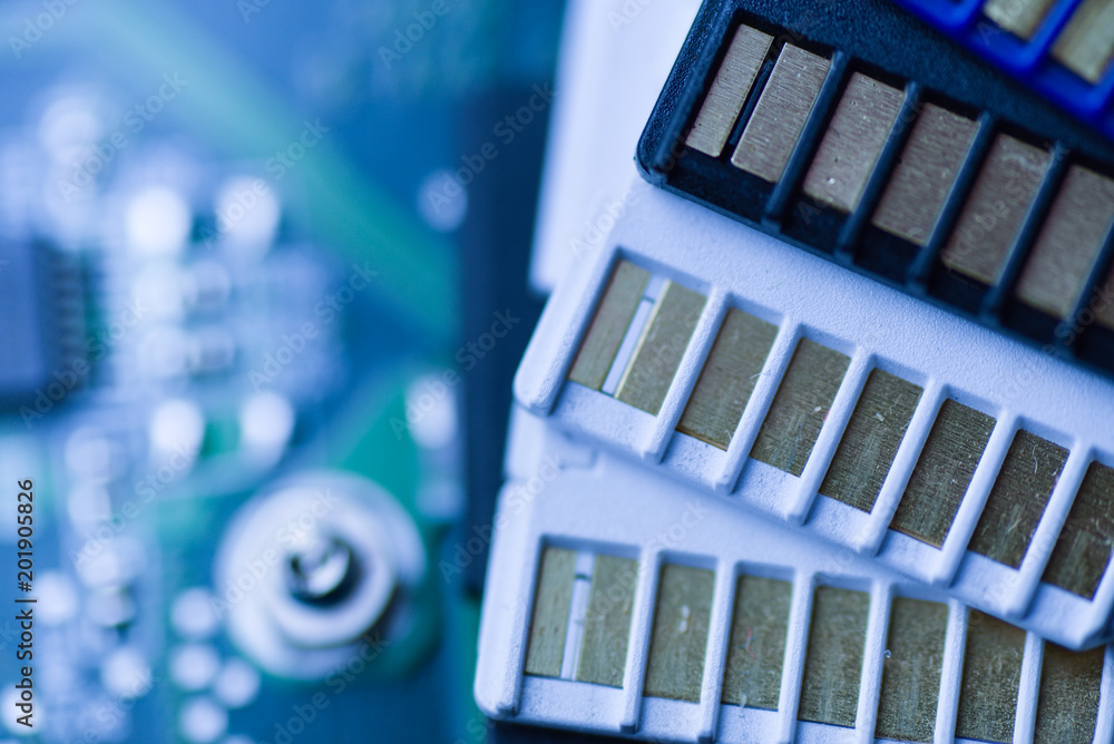 SD Cards with mainboard technical background Stock Photo | Adobe Stock