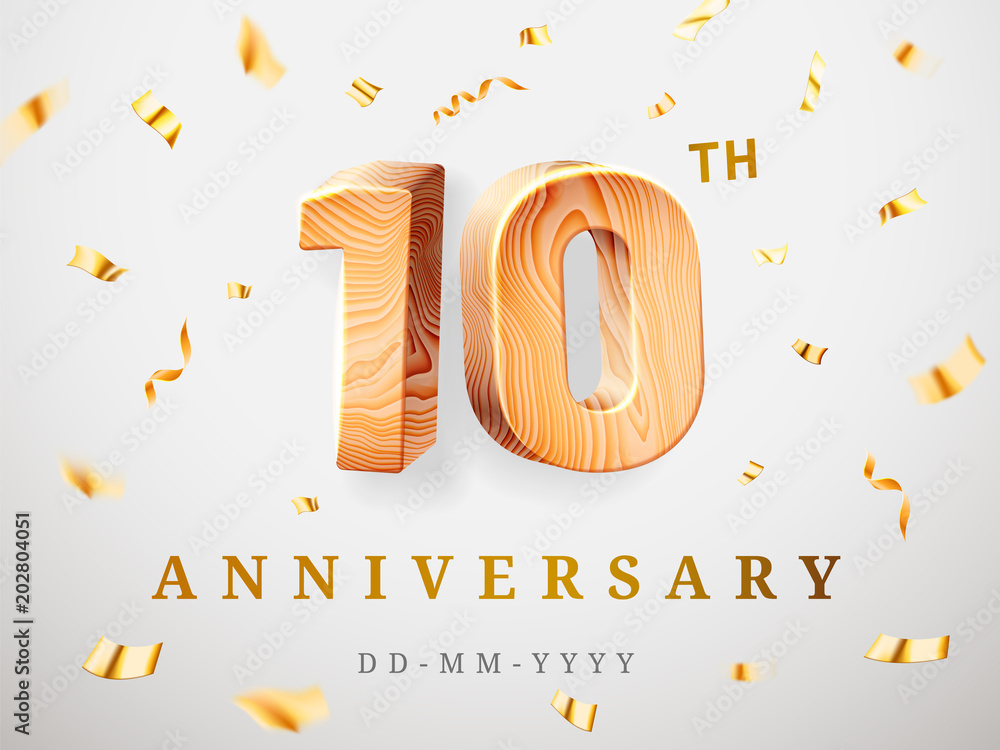 10 anniversary gold wooden numbers with golden confetti. Celebration ...