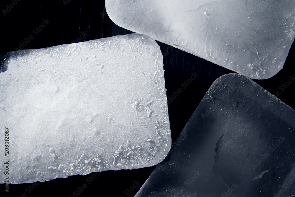 Ice block / Ice is water frozen into a solid state. it can appear ...