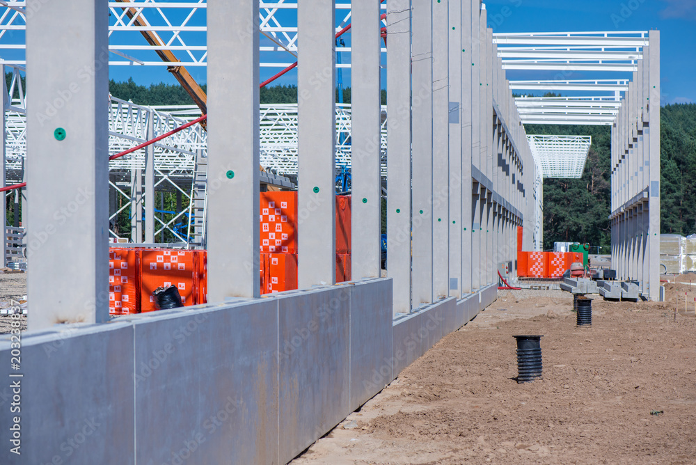 Industrial construction site of new shopping mall in a city. Reinforced ...