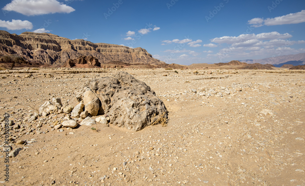 Volcanic bomb in geological Timna park that is located 25 km north of ...