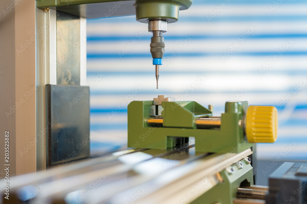 CNC milling machine processing plastic detail.Cutting plastic modern ...