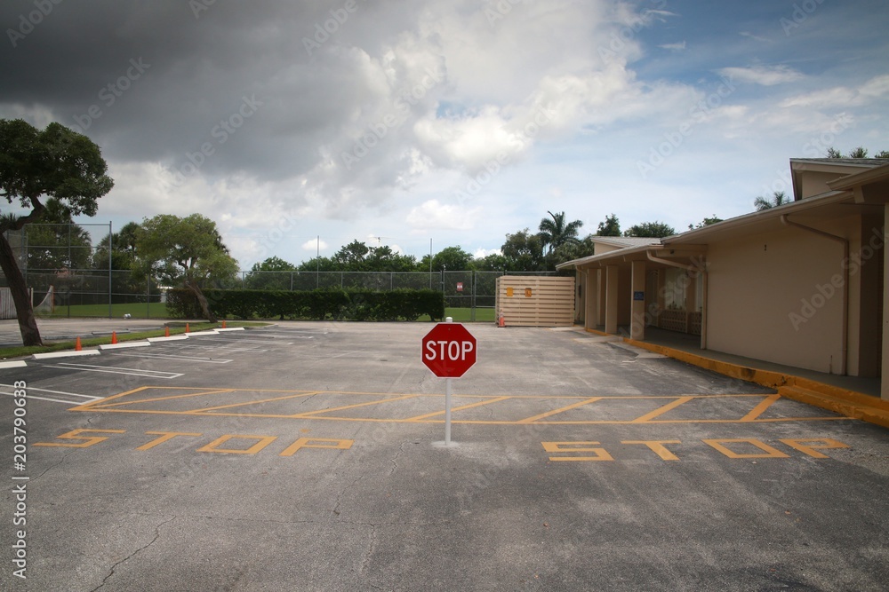 Stop Sign and Symbols with Diagonal Lines Painted on Pavement of ...