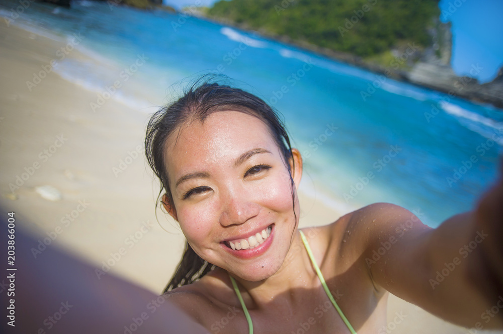 young happy and beautiful Asian Korean or Chinese tourist woman in ...