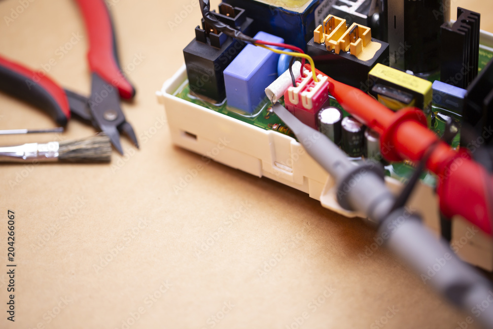 Repair Work Of Electronic Circuit Bord With Oscilloscope Probe Connect ...
