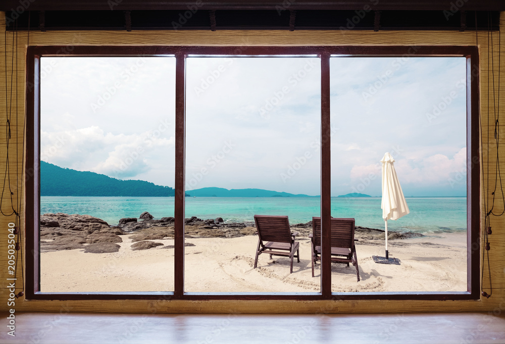 Opened window seeing tropical beach view in summer holiday at weekend ...