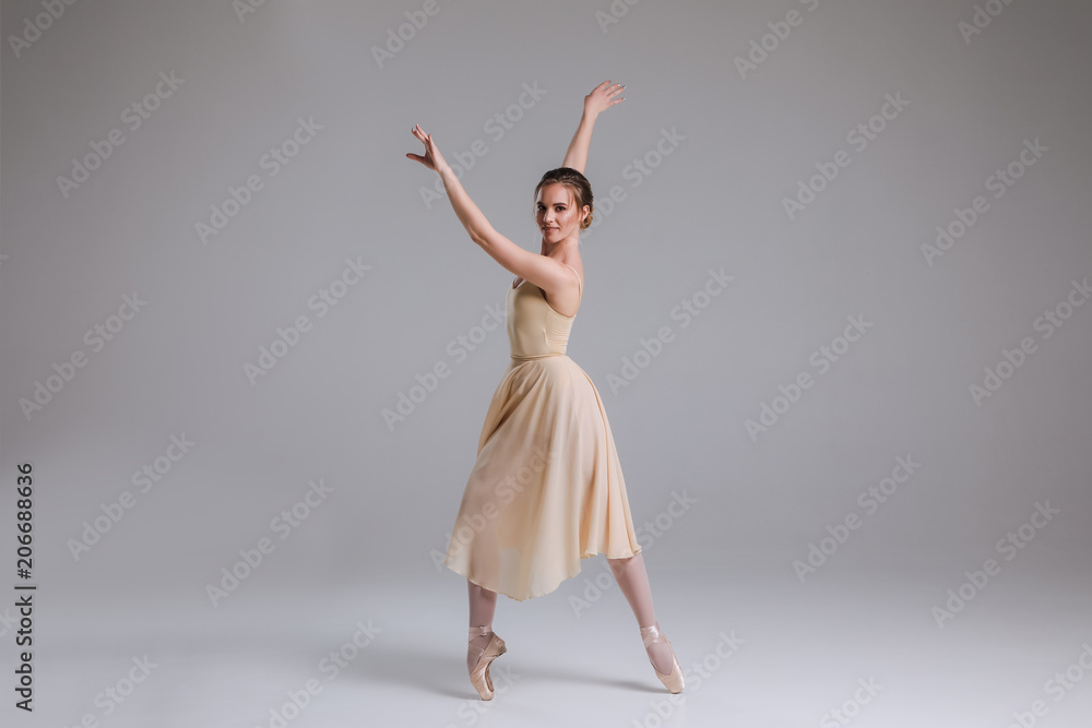 The reflection of a dancing lady! Young attractive gentle ballerina ...