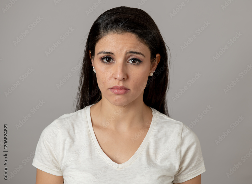 Human expressions, emotions. Young attractive woman with a sad face ...