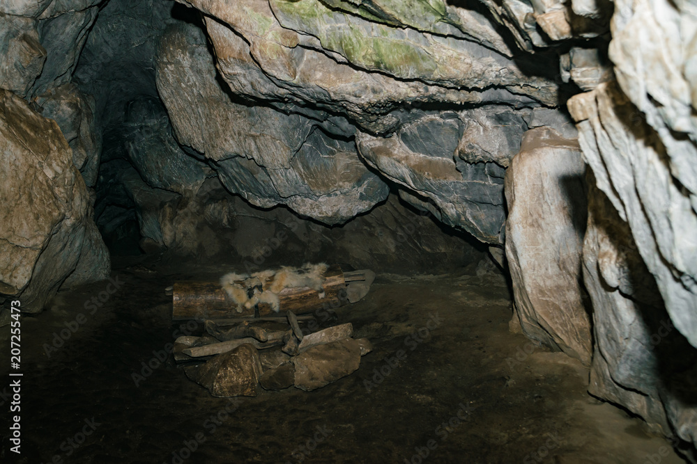 Beautiful cave. View from inside dark dungeon. Textured walls of cave ...