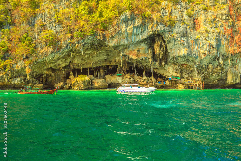 Boats visit Viking Cave, north of Piley Bay, one of main tourist ...