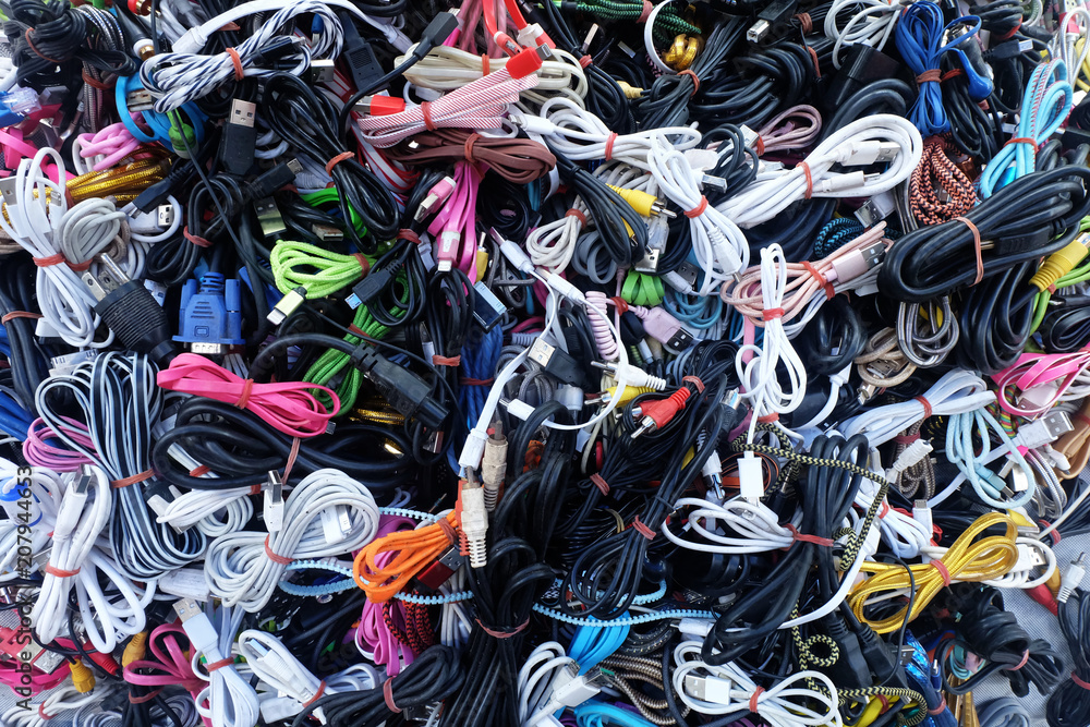Pile of colorful many used Cable cord Chargers, Wires Plug and USB ...