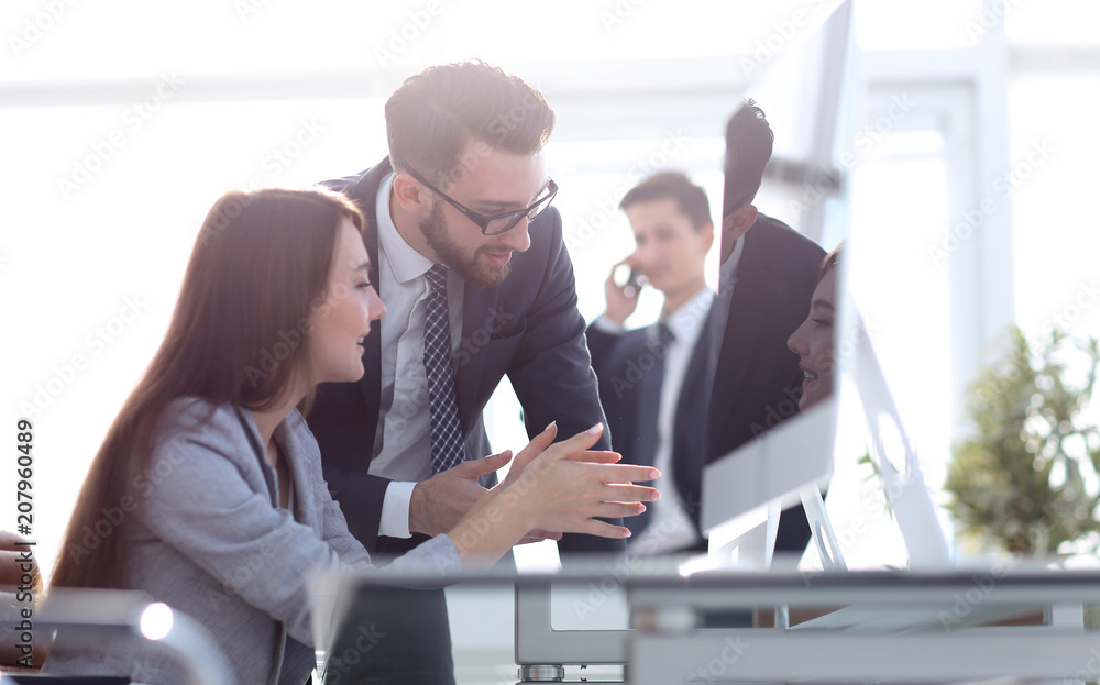 Manager talking with an employee Stock Photo | Adobe Stock