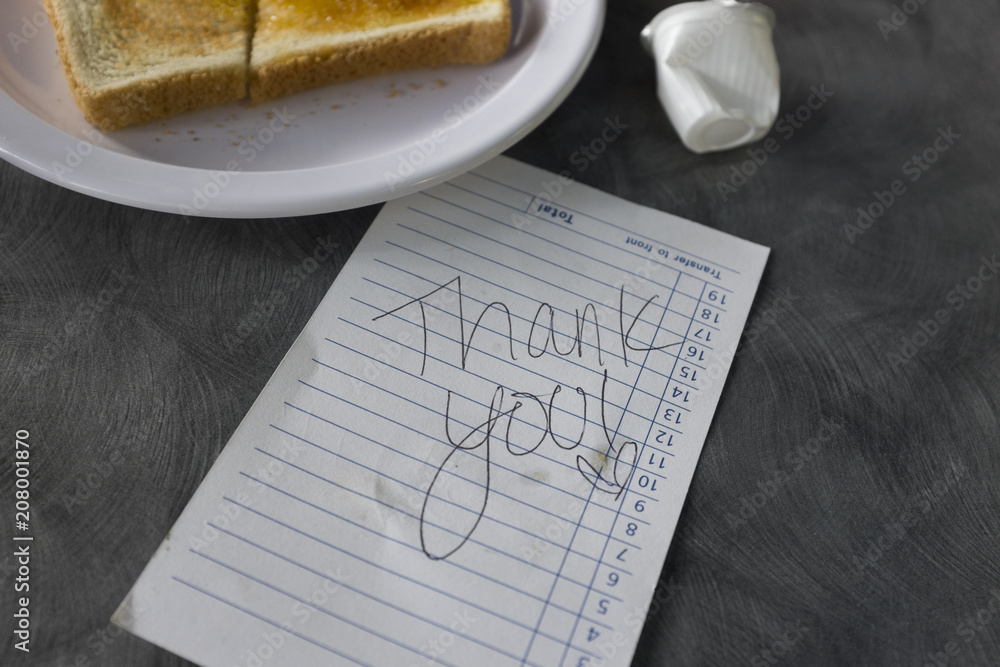 Thank you note on a check Stock Photo | Adobe Stock