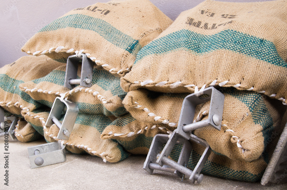 U-type metal in sack. Sack is brown and green. metal using in construct ...