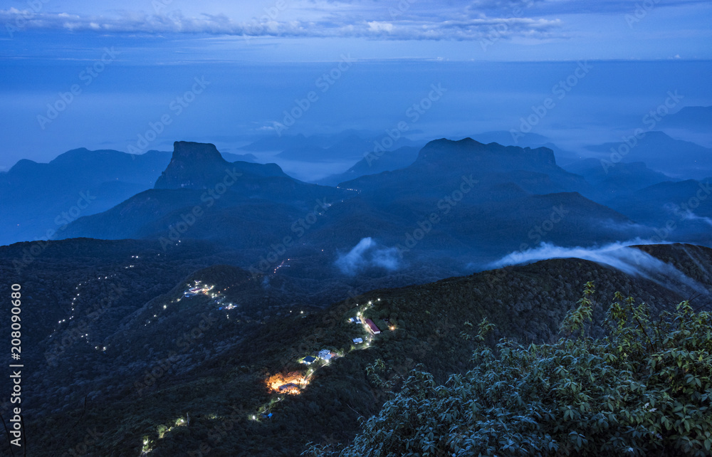 Lights marking the pilgrim trail through the forest to Sri Pada (Adams ...