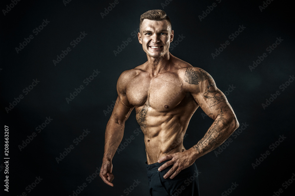 Strong bodybuilder with six pack. Bodybuilder man with perfect abs ...