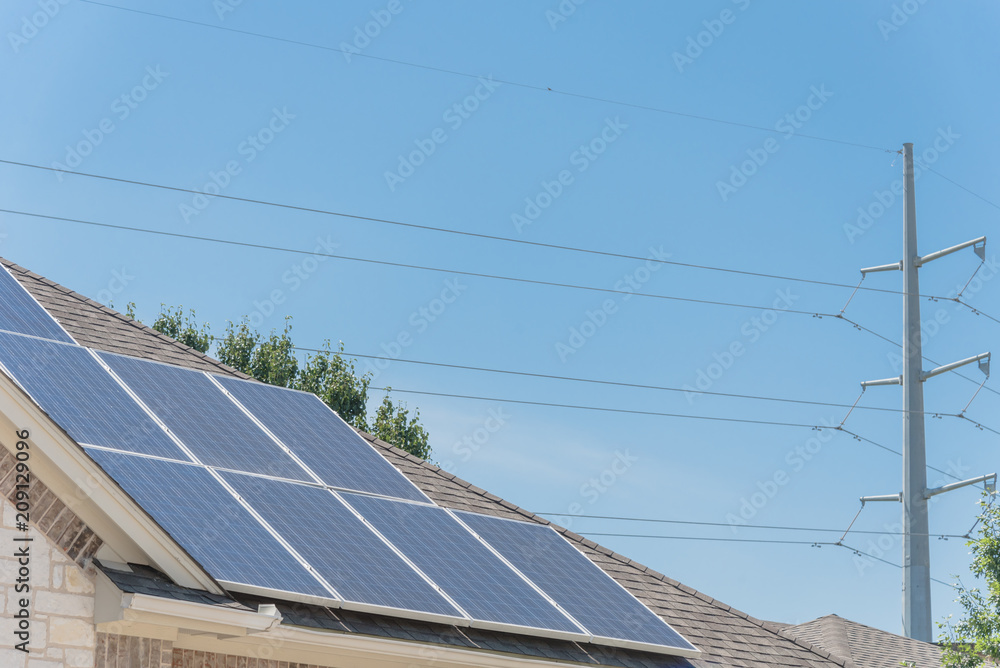 Renewable clean vs. traditional energy concept. Close-up solar panel ...