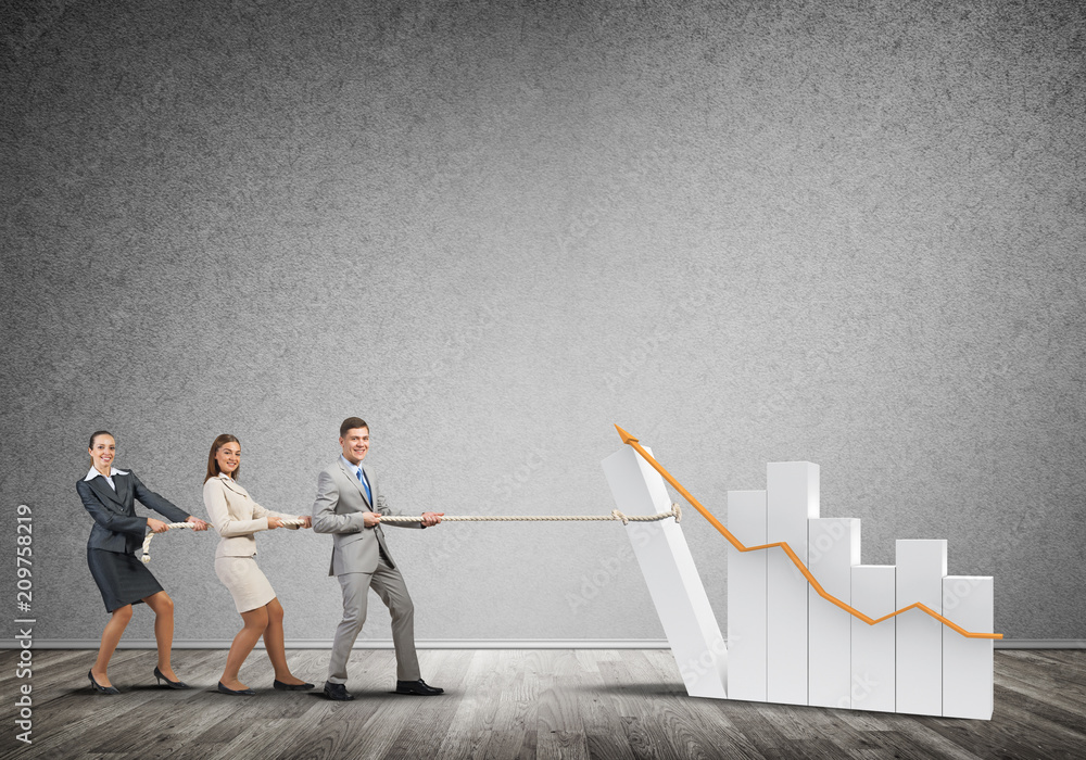 Businessteam working in collaboration pulling graph with rope as symbol ...