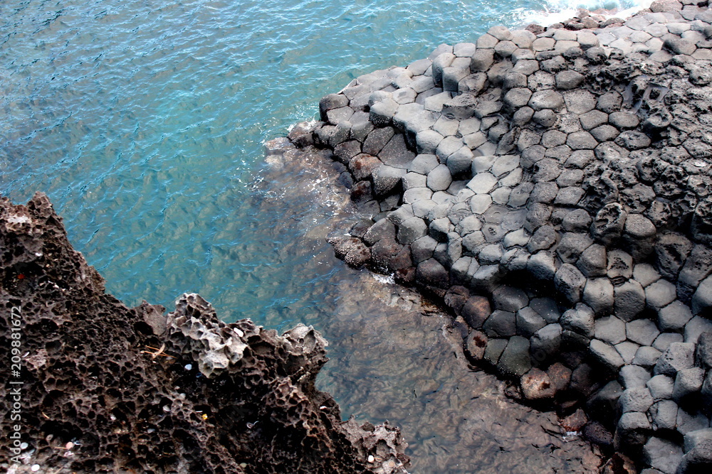 Jusangjeolli is a cliff made of basaltic columnar jointings at Jisatgae ...