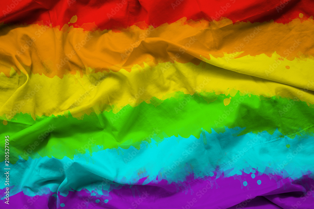 rainbow flag of LGBTQ for Pride month on fabric texture with ripple ...