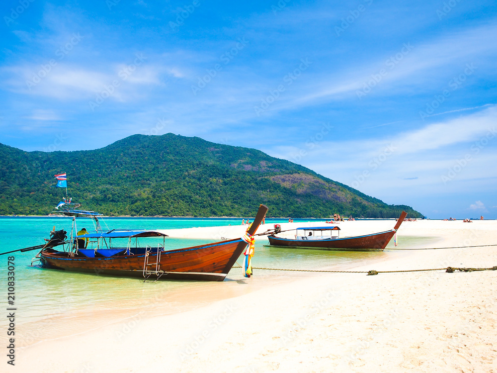 White Sand Beach With Boats