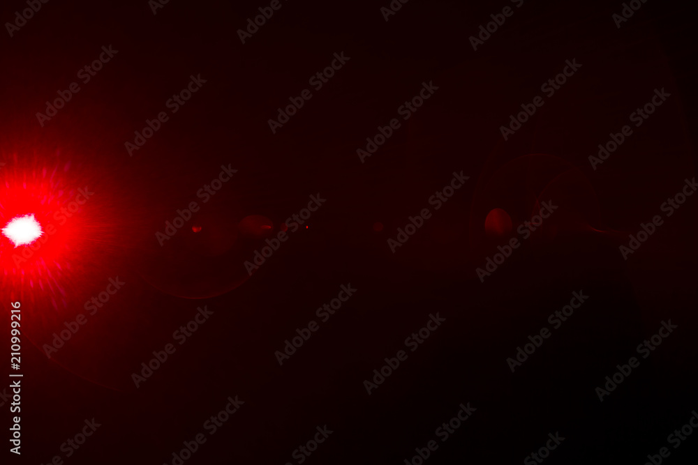 Camera lens flare by laser light create circles of objective and ...