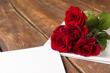 Three Red Roses On Wood Background Free Stock Photo - Public Domain ...