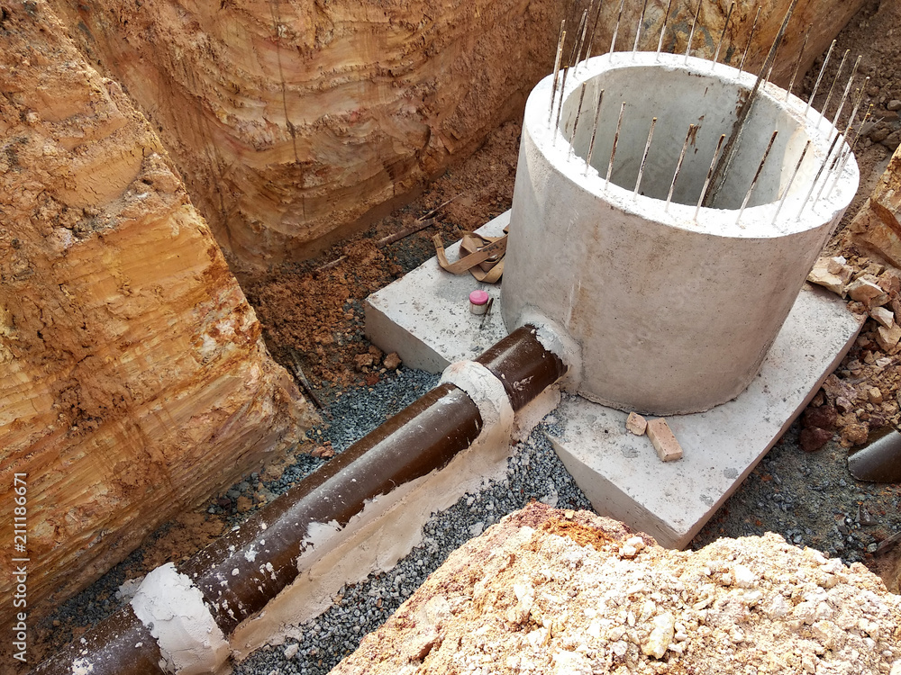 Sewerage manhole and pipes line under construction at the construction ...