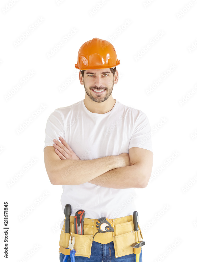 Handyman portrait. Young construction worker wearing hard hat and tool ...