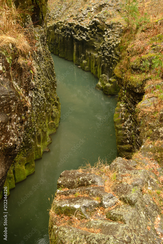 Wide detail of Gokase river running through Takachiho gorge, with ...