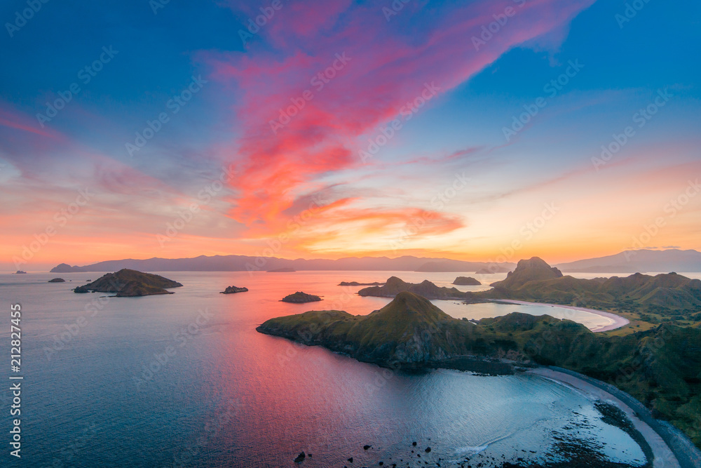 Colorful sunset view of part of Padar Island in an evening from Komodo ...