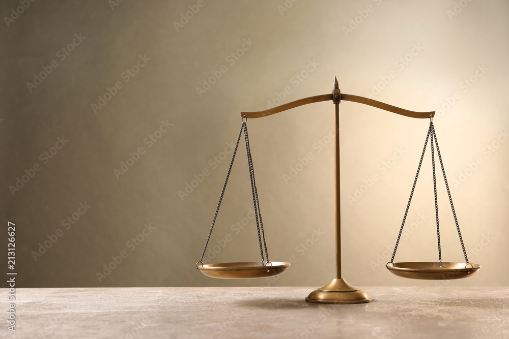 Scales of justice on table. Law concept Stock Photo | Adobe Stock